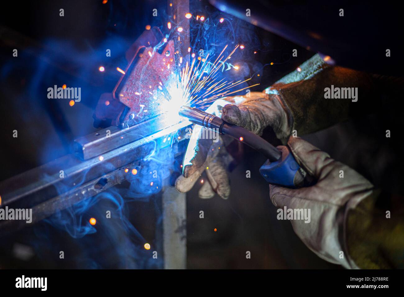 Metal welding. Fire from operation of welding machine. Manufacture of ...