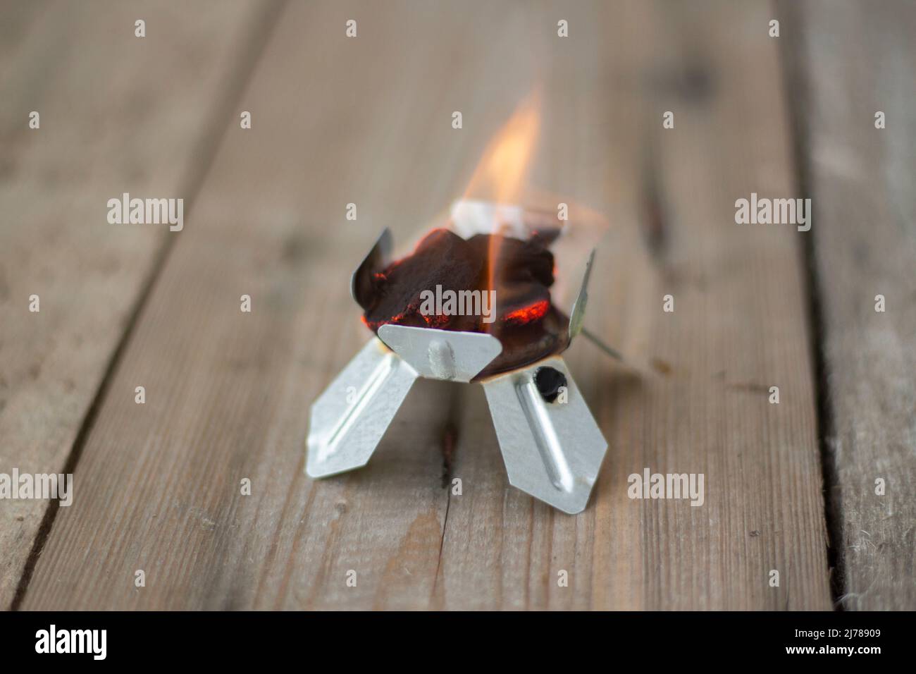 Flames from alcohol. Burning dry alcohol. Object for heating substances ...