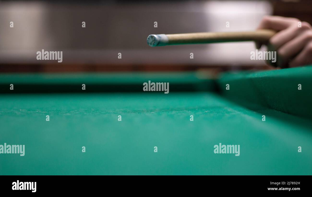 Billiard balls are white. Green billiard table. Playing in bar. Sports ...