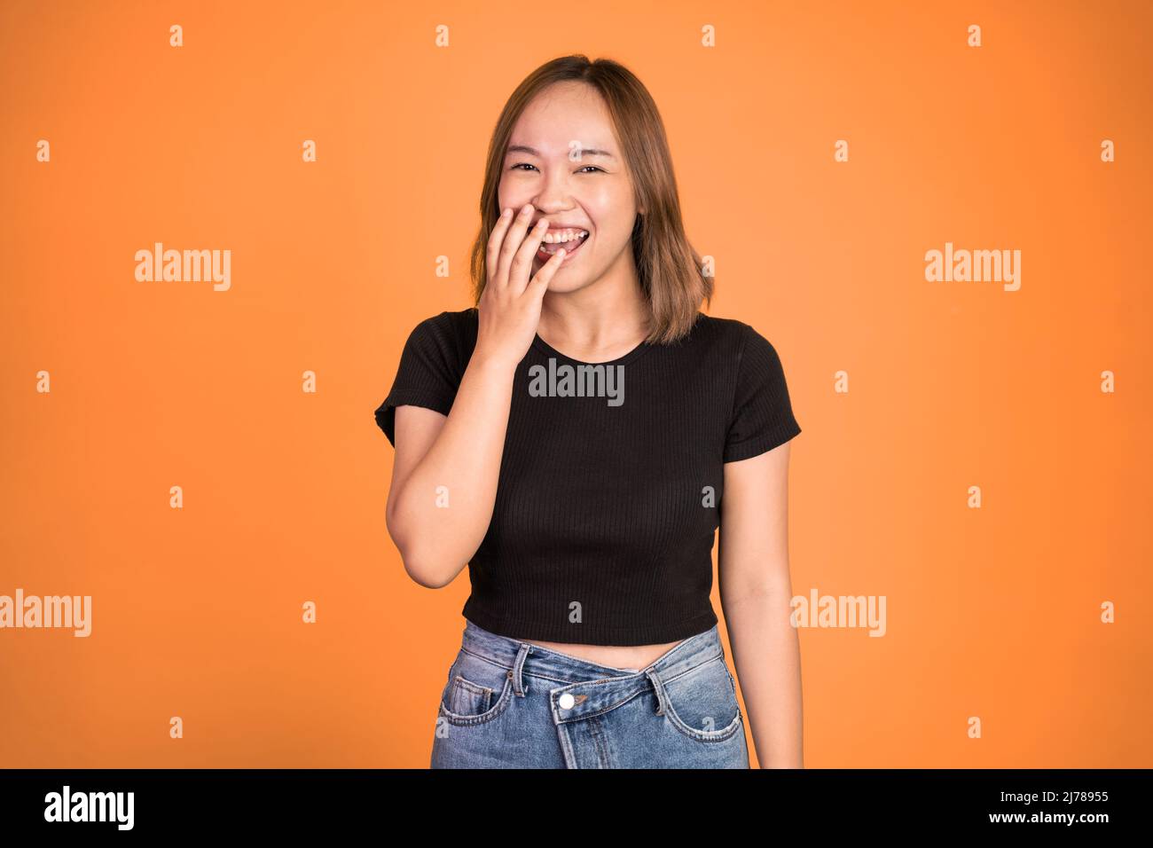 excited beautiful woman feeling joy laughing on isolated background ...
