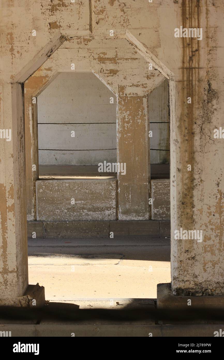 Arcade of concrete columns hold up the railroad bridge Stock Photo - Alamy