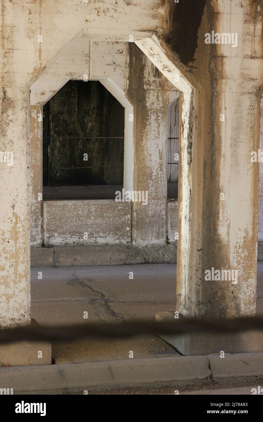 Arcade of concrete columns hold up the railroad bridge Stock Photo - Alamy
