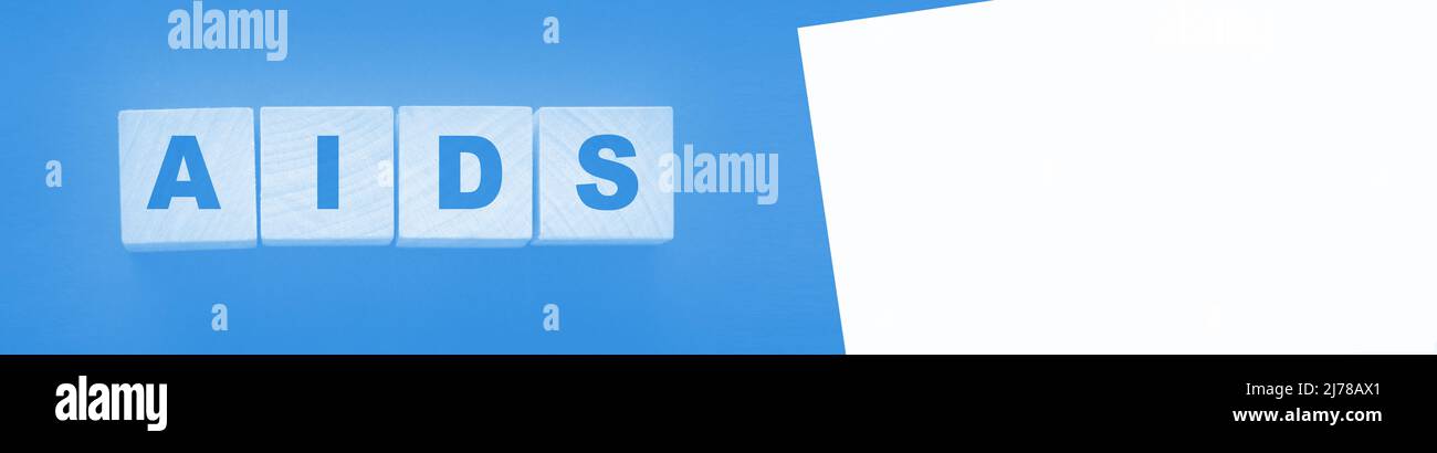 AIDS abbreviation written on wooden cubes. Healthcare concept. STD ...