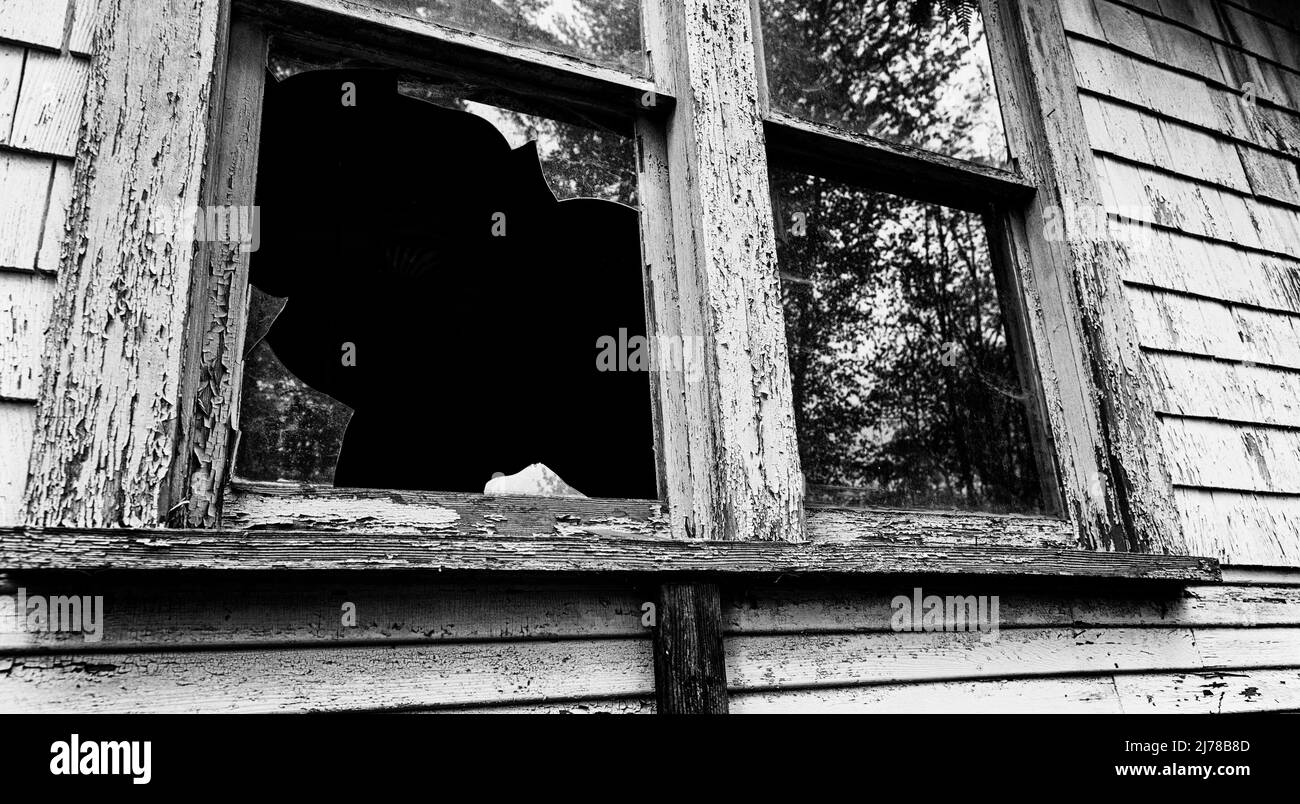 Broken smashed window Black and White Stock Photos & Images - Alamy