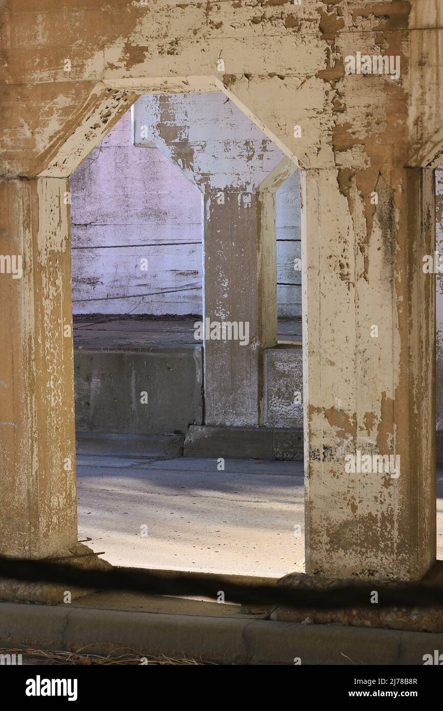 Arcade of concrete columns hold up the railroad bridge Stock Photo - Alamy