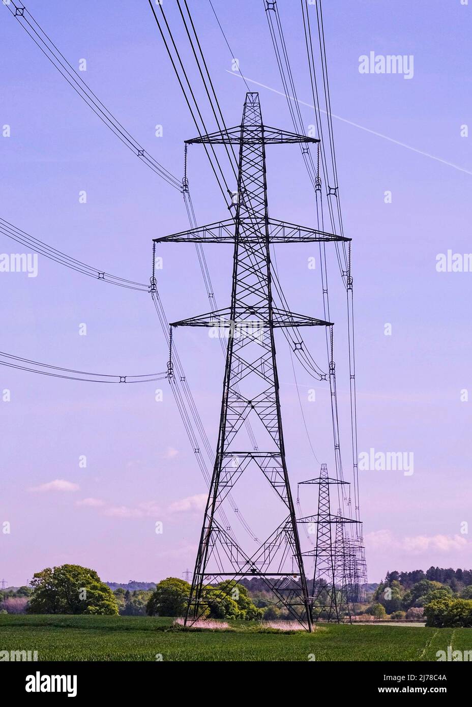Power cable pylons in the Sussex countryside Stock Photo - Alamy