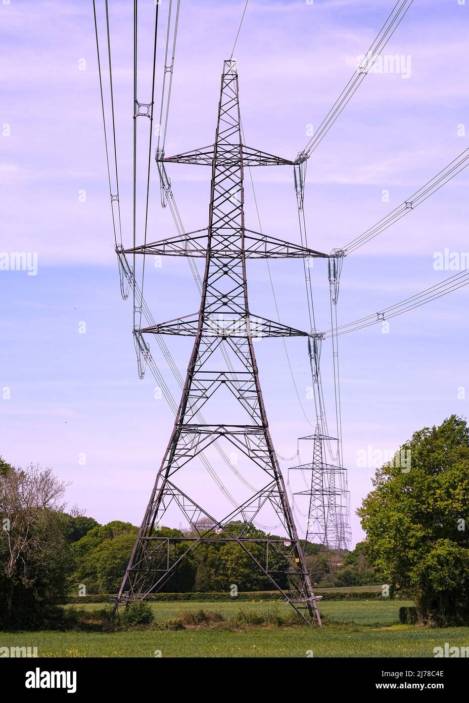 Power cable pylons in the Sussex countryside Stock Photo - Alamy