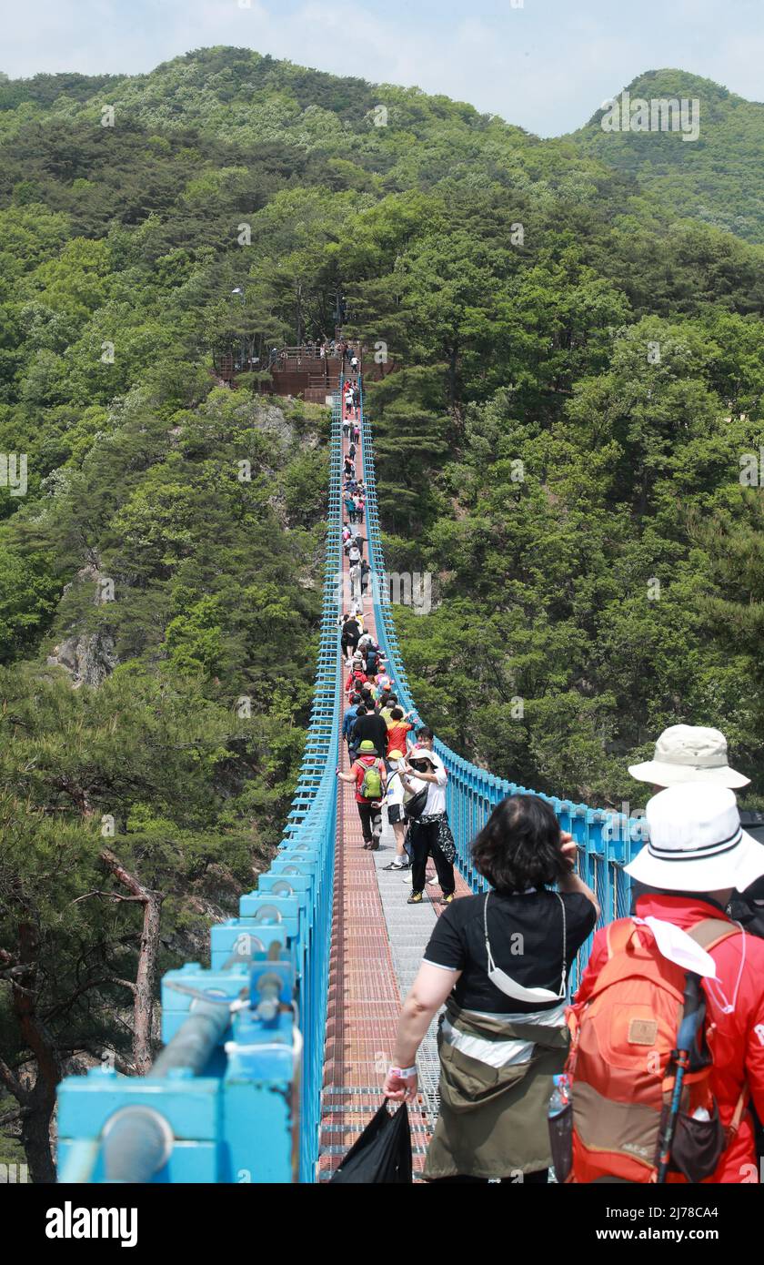 Suspension bridge in Wonju Visitors cross a suspension bridge at Mount ...