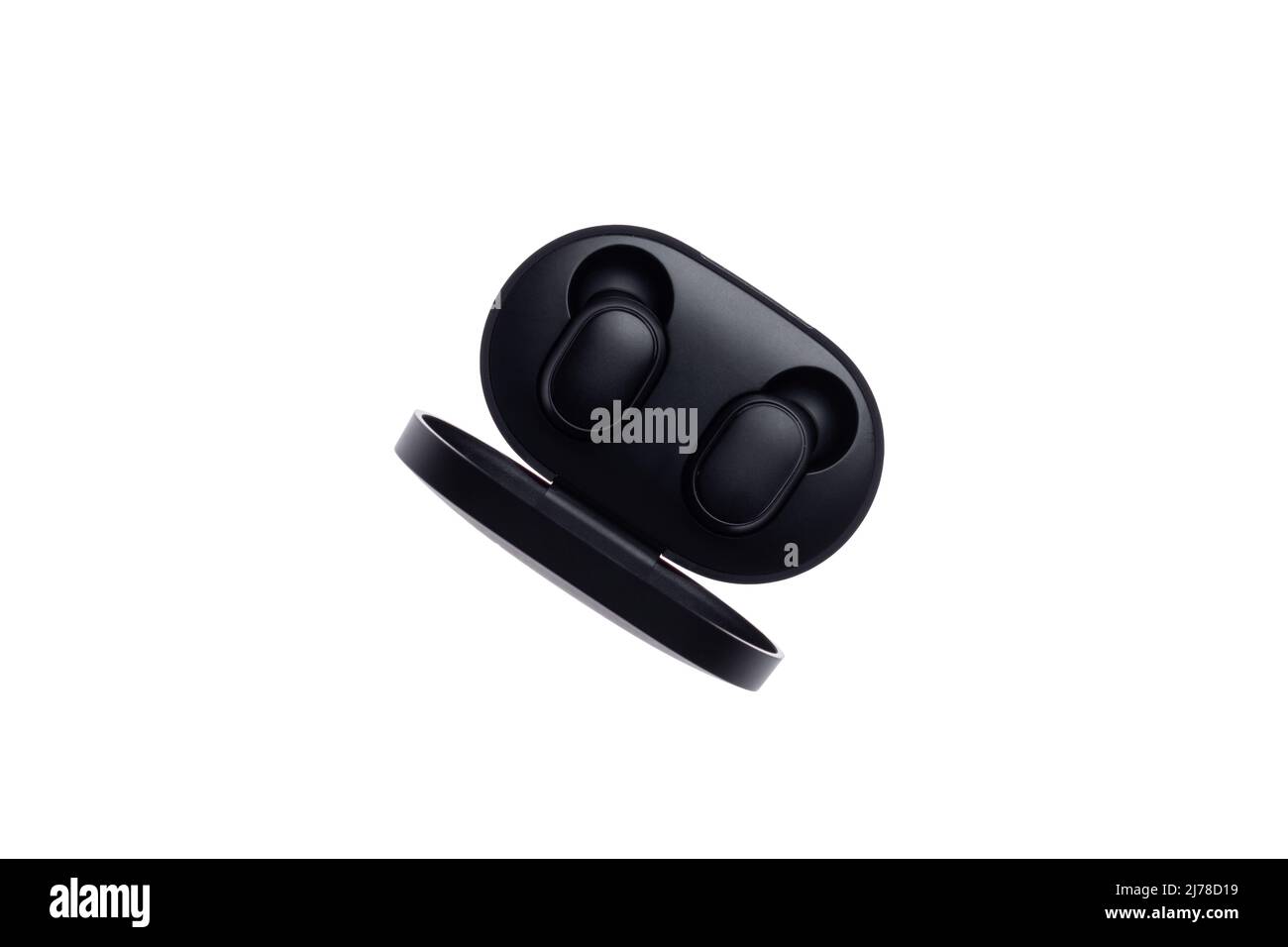 Wireless black bluetooth earphones with contactless charging isolated ...