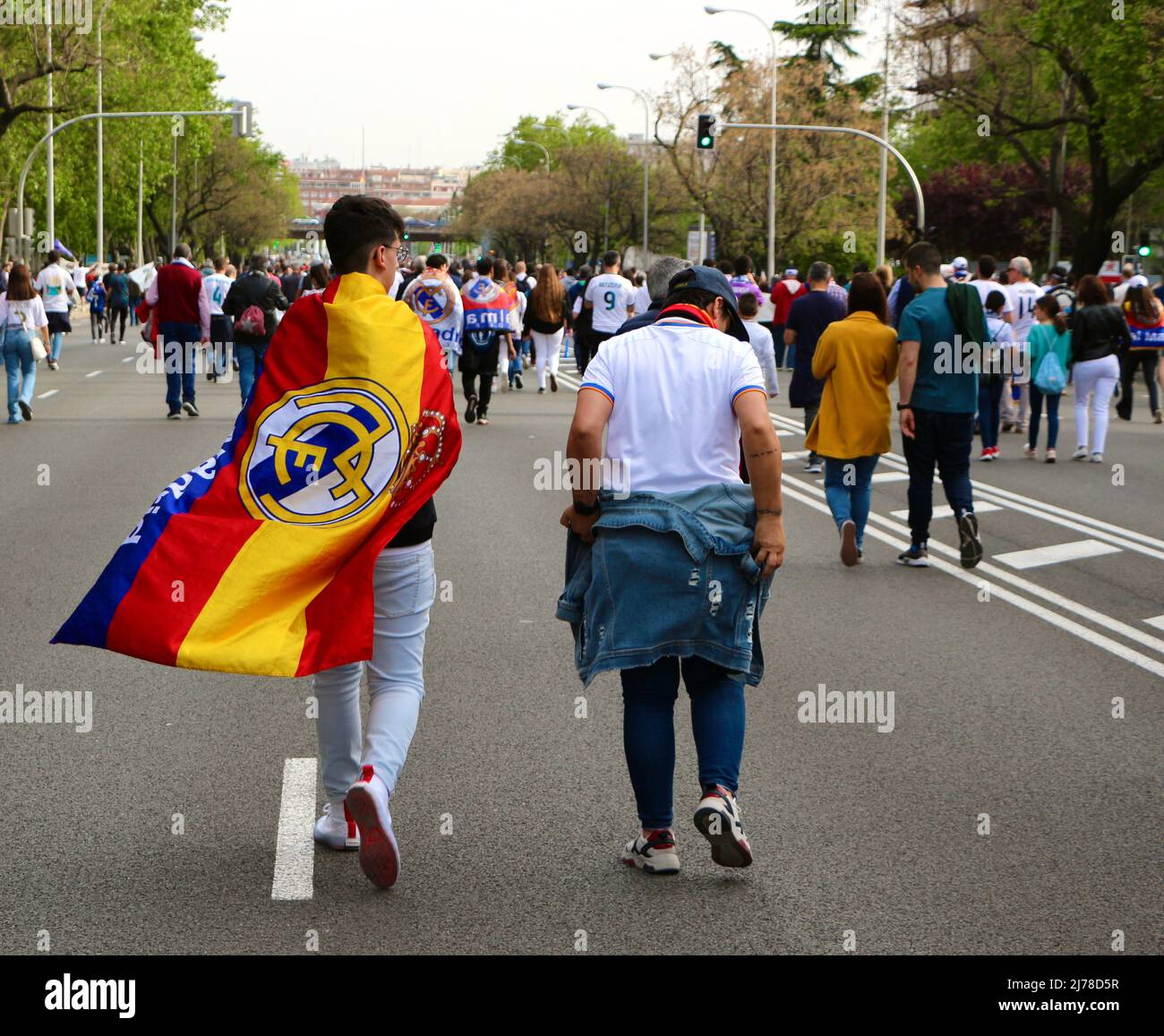 Real Madrid fans walking from the Bernabeu stadium to the Cibeles ...