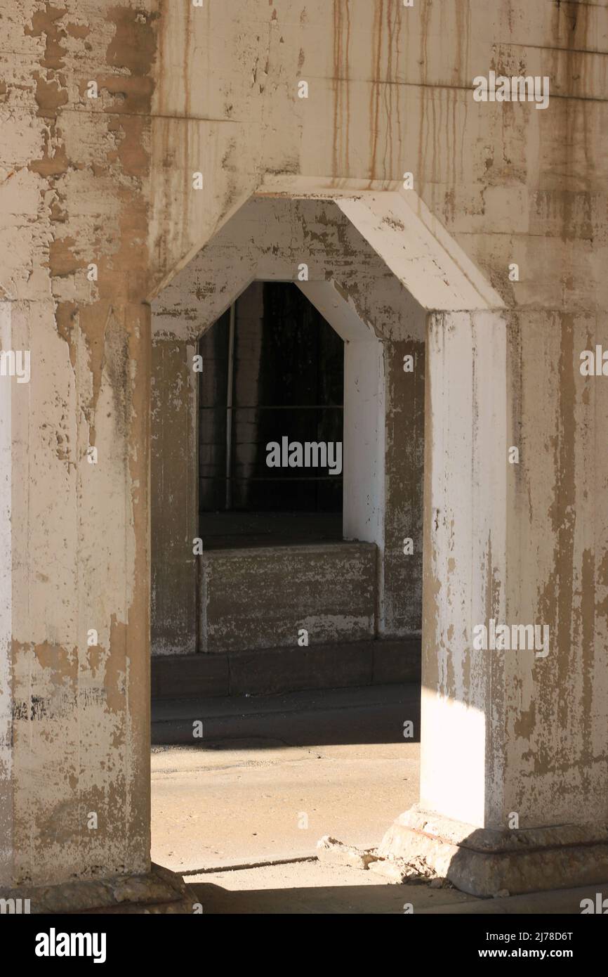 Arcade of concrete columns hold up the railroad bridge Stock Photo - Alamy