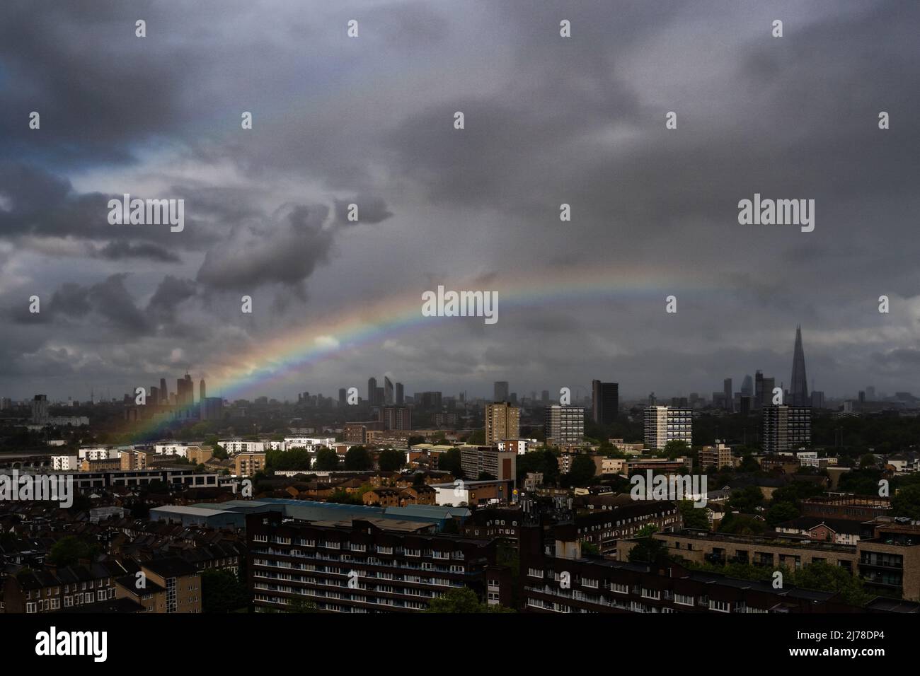London, UK. 7th May, 2022. UK Weather: A massive rainbow breaks over ...