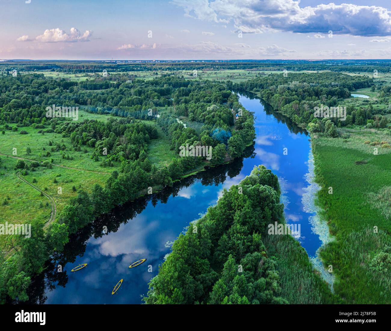 Canoes on the calm river. Top view. Beautiful picture of river and ...