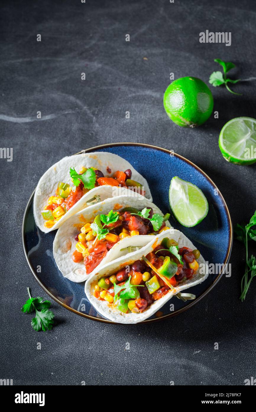 Healthy and tasty tacos as small colorful appetizer. Spicy Vegetarian ...