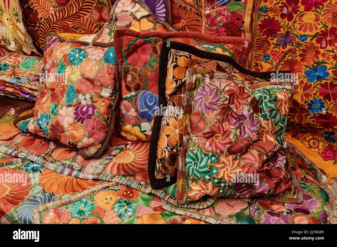 A pile of colorful Andean fabric textiles on the local market in ...