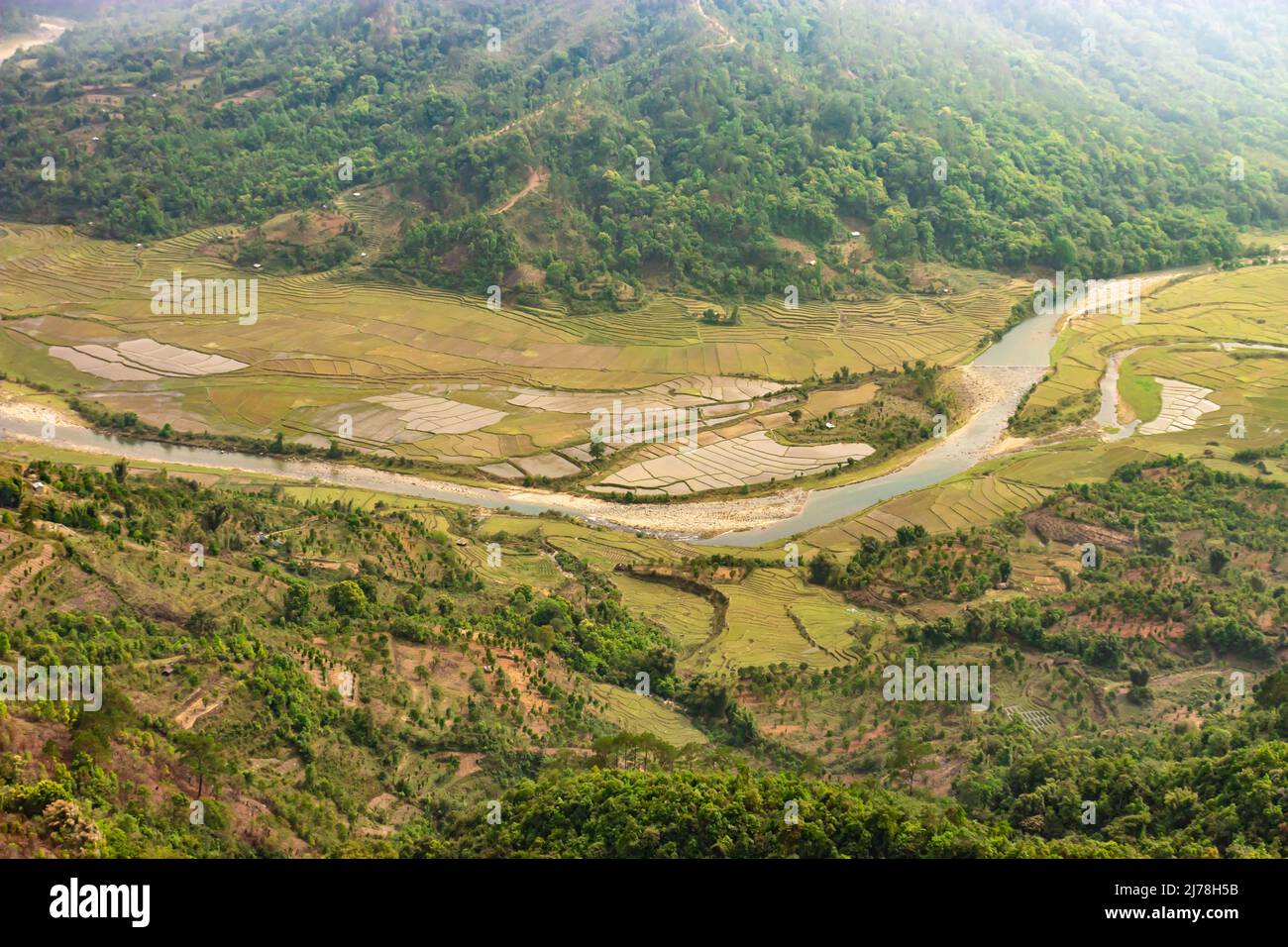 agriculture farming Fields with river flowing and surrendered by ...