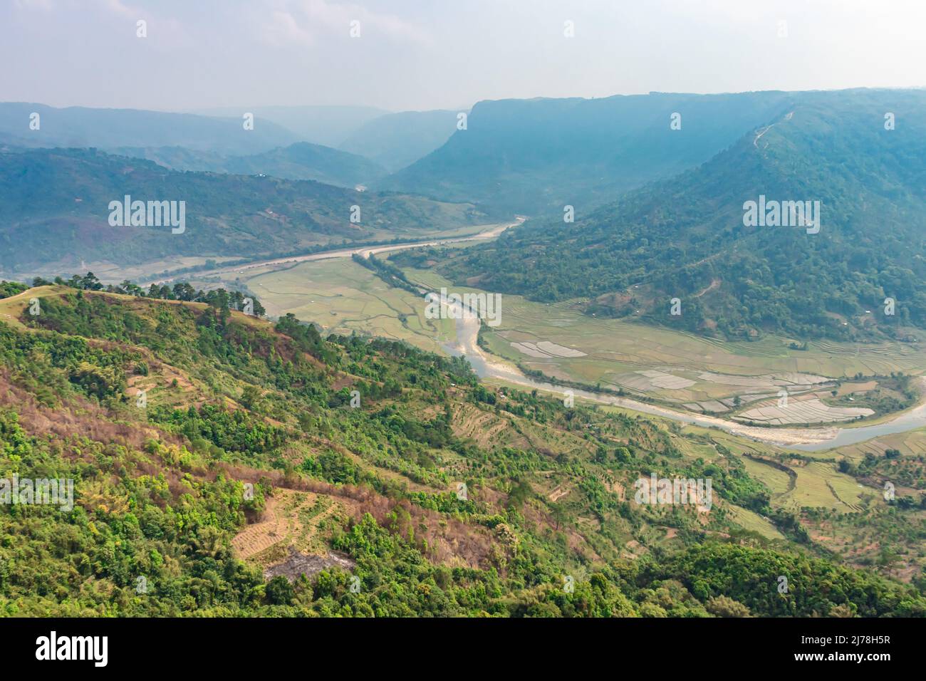 agriculture farming Fields with river flowing and surrendered by ...