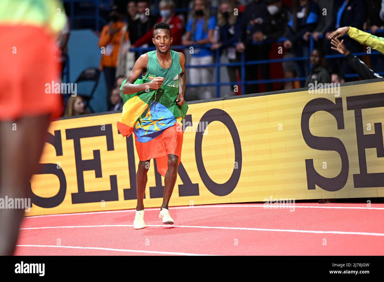 Selemon Barega with the Ethiopia flag at the Belgrade 2022 Indoor World ...