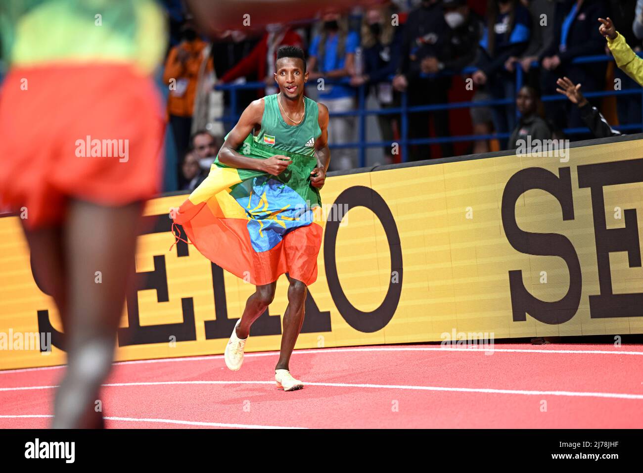 Selemon Barega with the Ethiopia flag at the Belgrade 2022 Indoor World ...