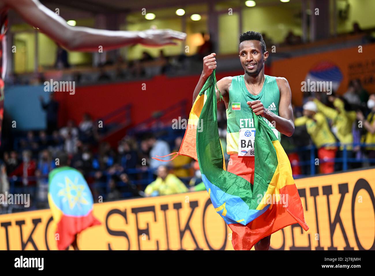 Selemon Barega with the Ethiopia flag at the Belgrade 2022 Indoor World ...