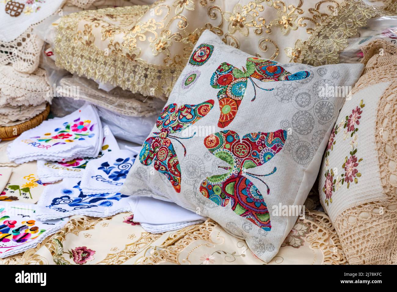 Colorful Andean fabric textiles on the local souvenir market in Otavalo ...