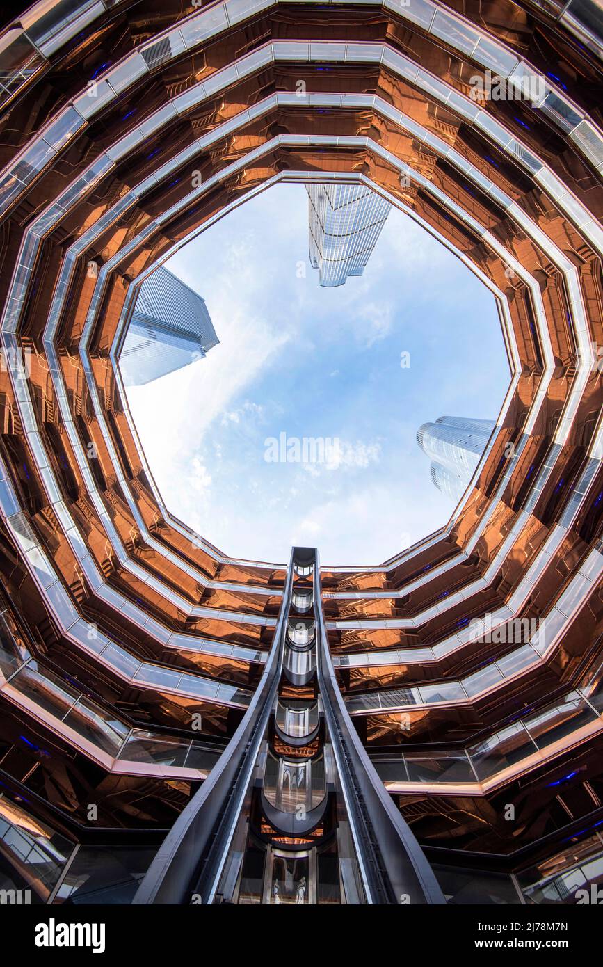 Looking up through Vessel in Hudson Yards in Manhattan New York City ...