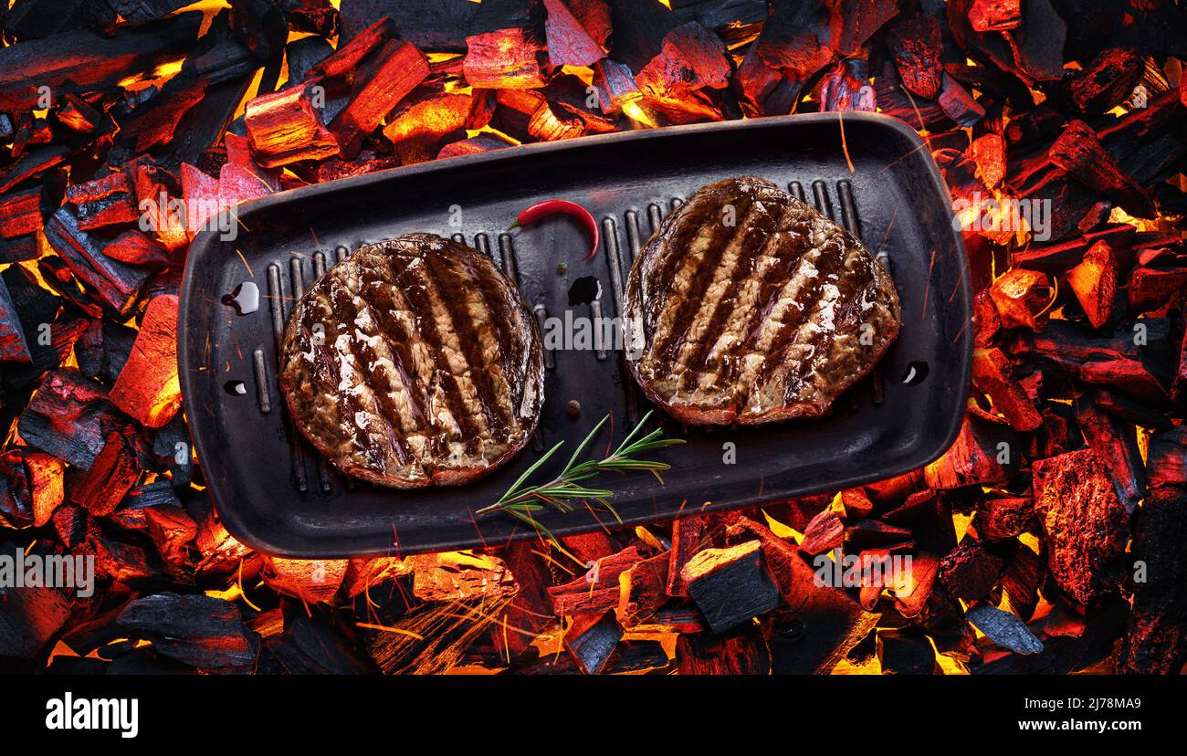 Two beef steaks roasting on hi-res stock photography and images - Alamy