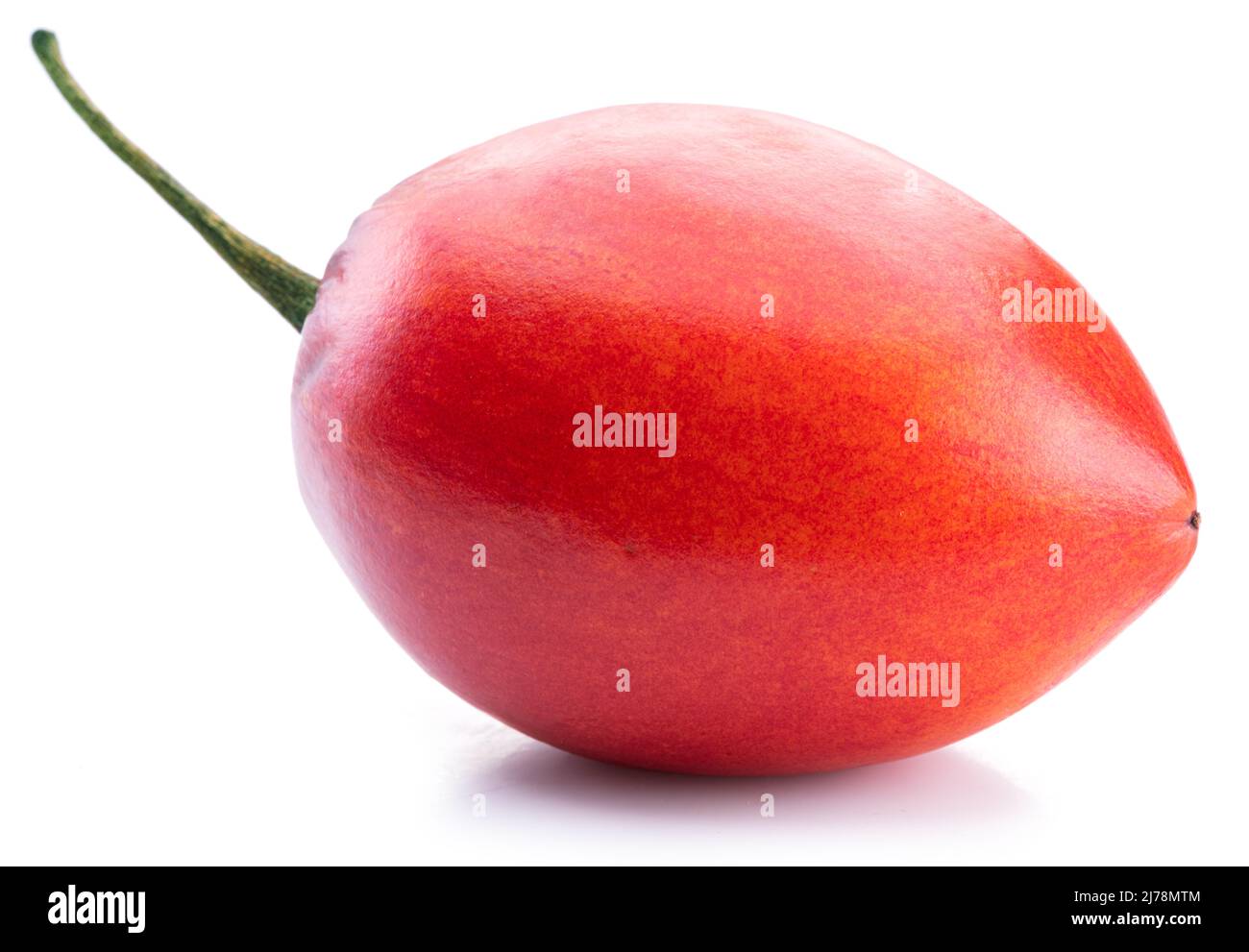 One ripe tamarillo fruit isolated on a white background Stock Photo - Alamy