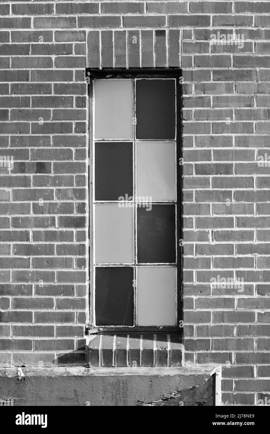 Bohemian brick building with an interesting alternating pane window in ...