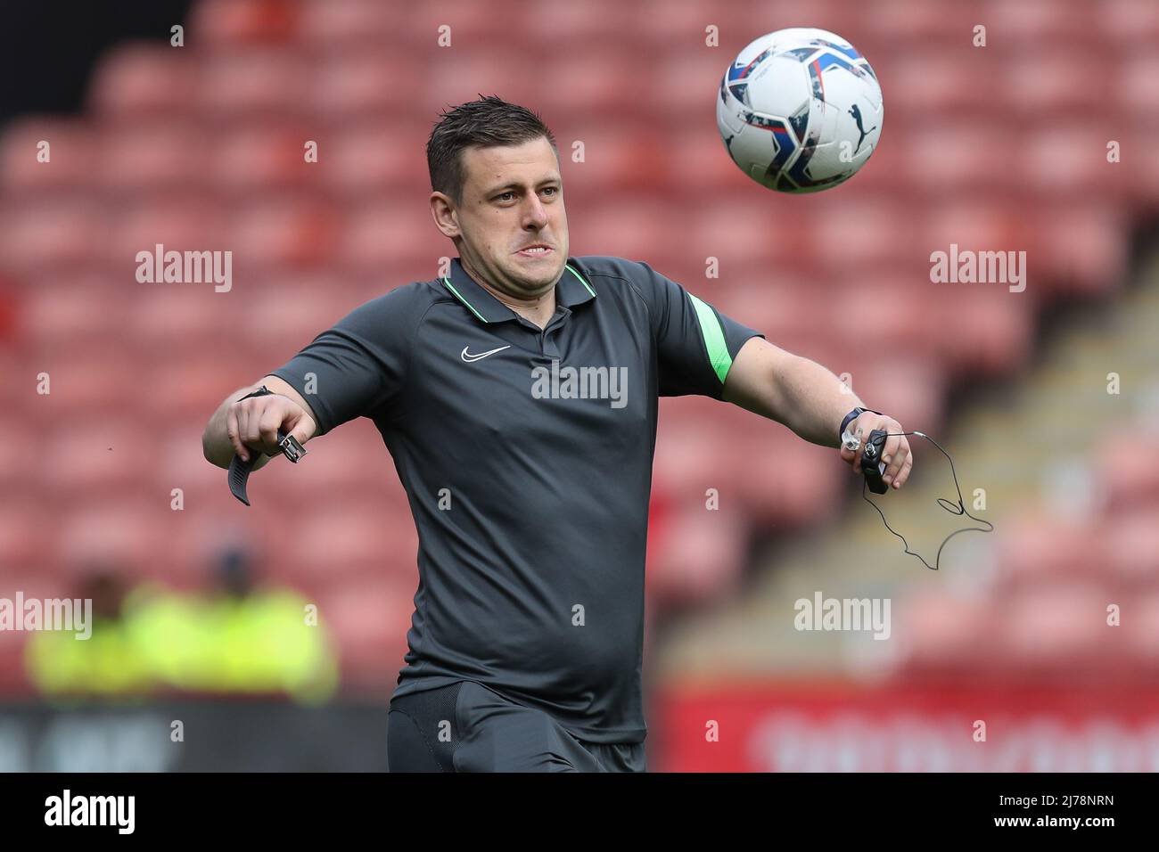 Referee Josh Smith tests his football skills during the pre match pitch ...