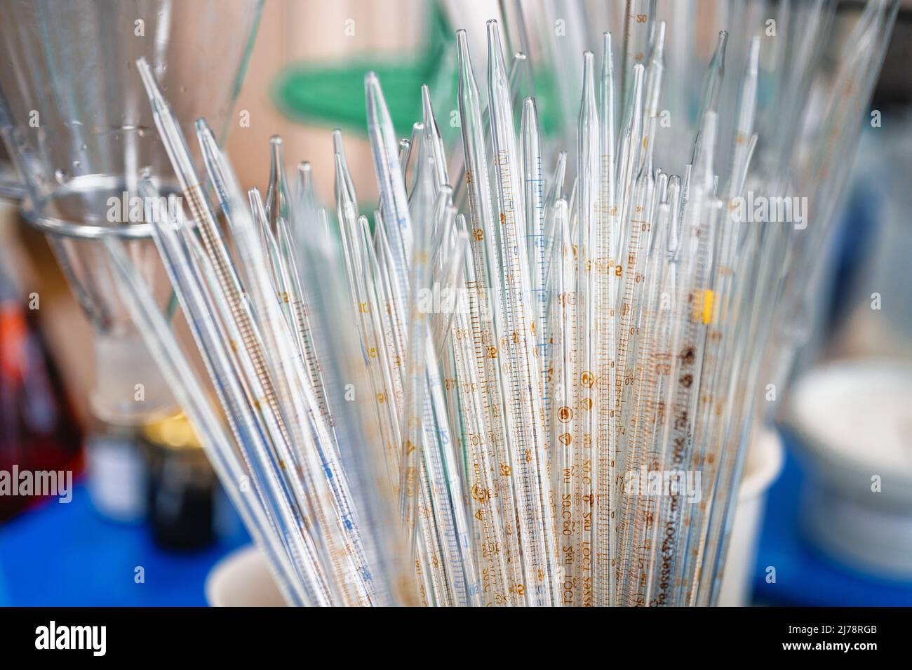Bunch of glass pipettes with samples of alcohol drinks Stock Photo - Alamy
