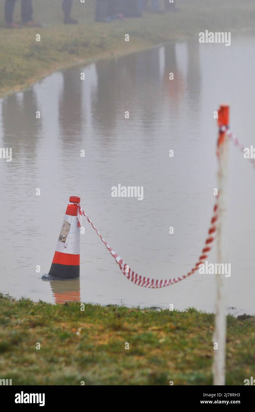 safety cone guarding danger Stock Photo - Alamy