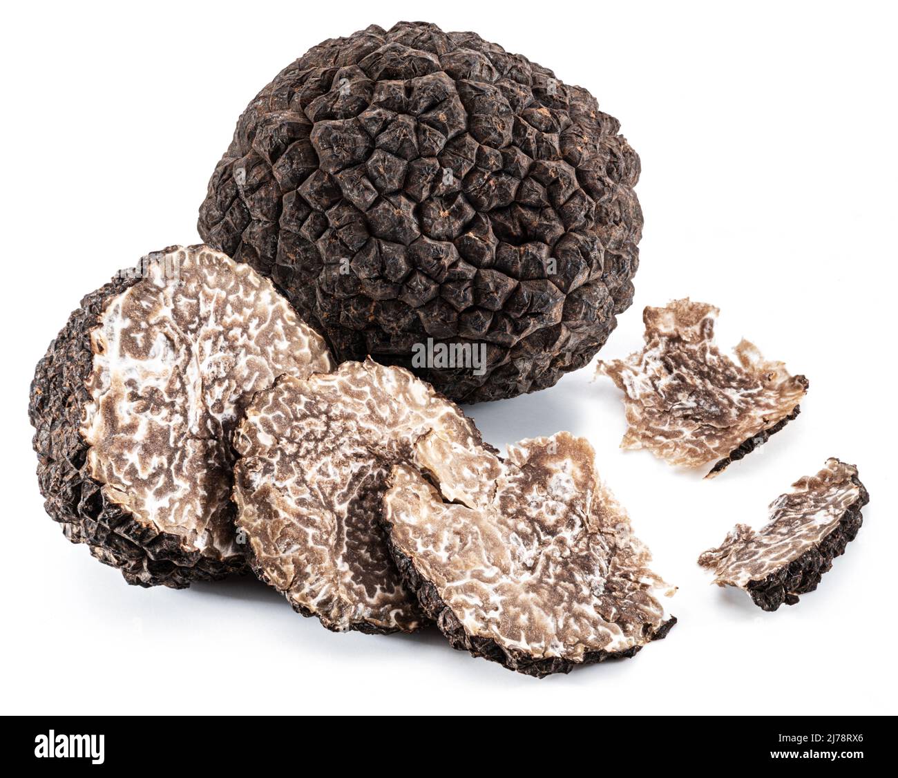 Black winter truffles and truffle slices on white background. The most ...