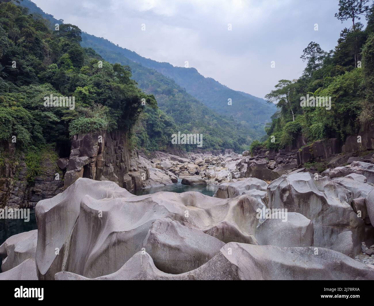 naturally formed white shiny stone in unique shape at dry river bed at ...