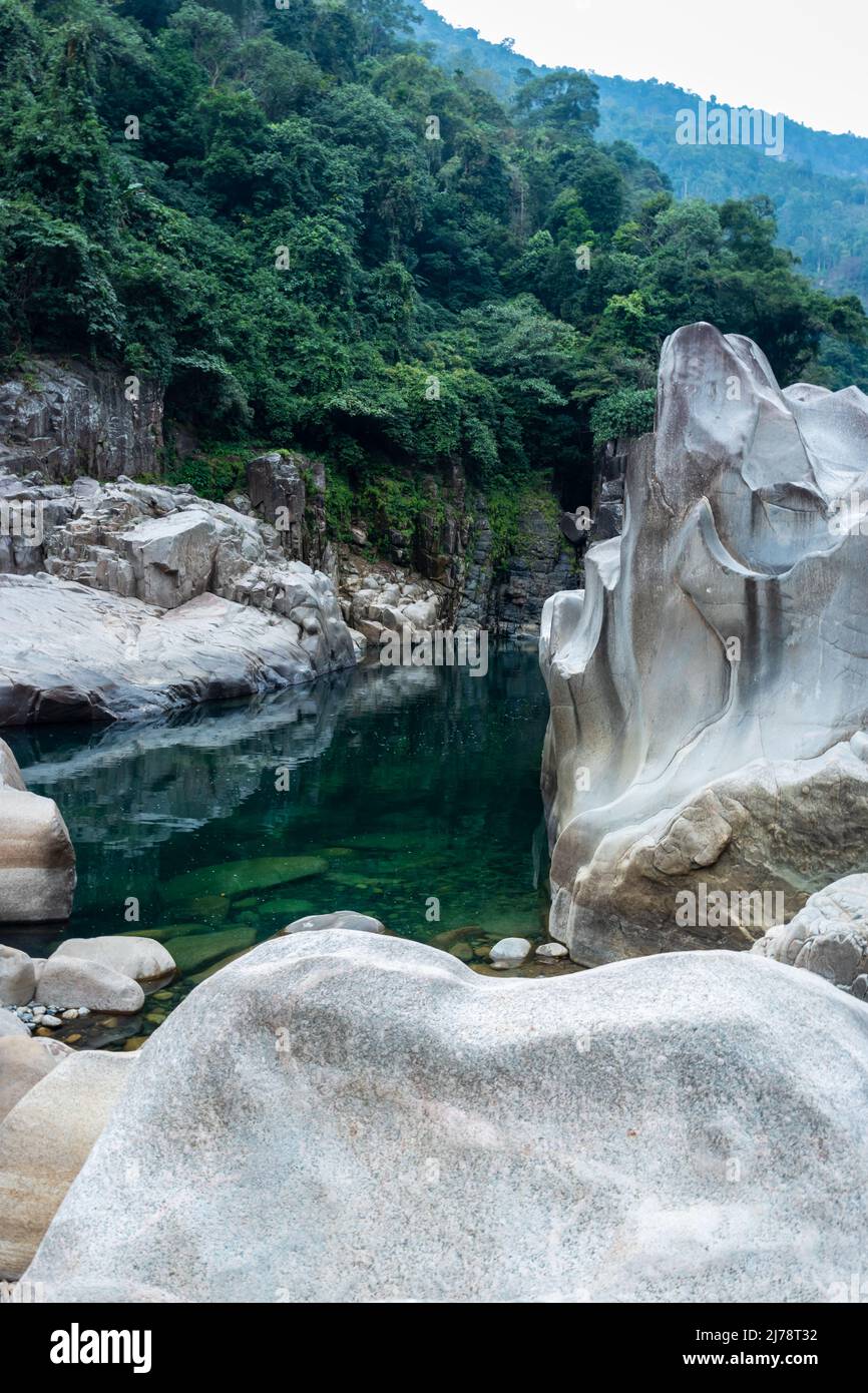 naturally formed white shiny stone in unique shape at dry river bed at ...