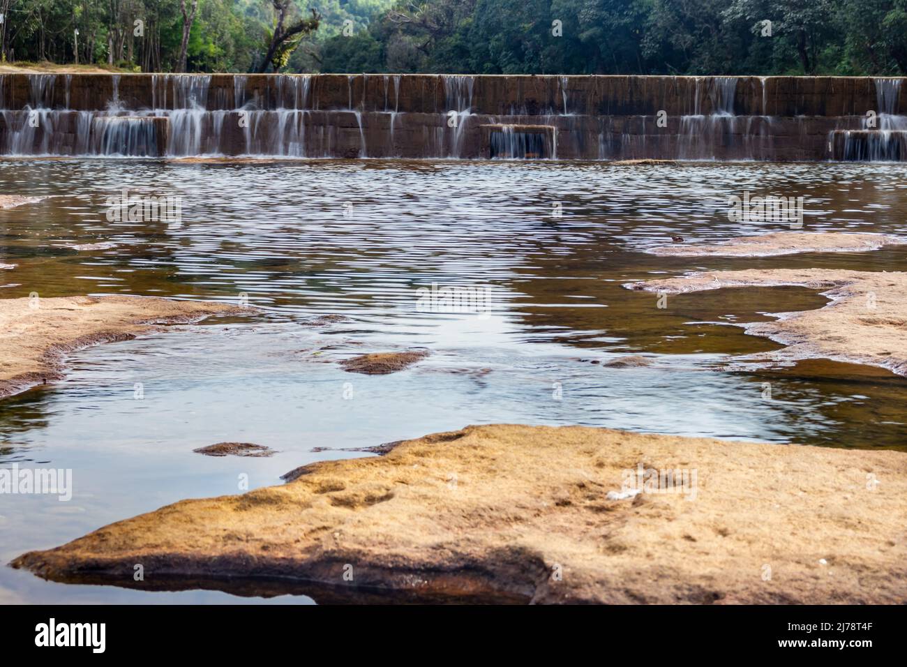 river water streams falling from stairs at morning from flat angle ...