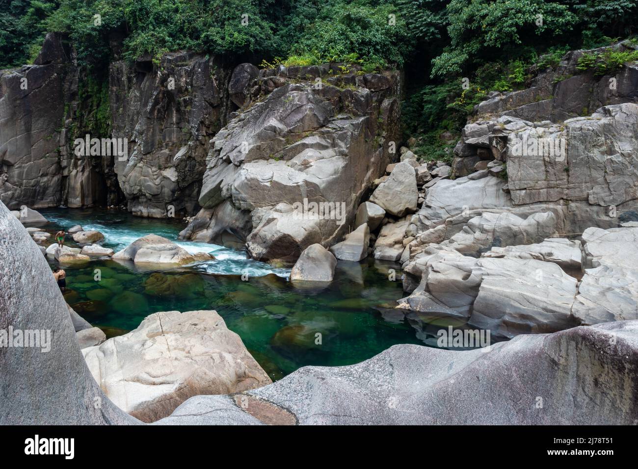 naturally formed white shiny stone in unique shape at dry river bed at ...