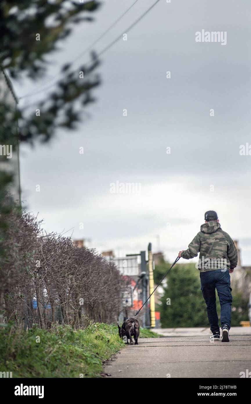 Man from behind walking hi-res stock photography and images - Alamy