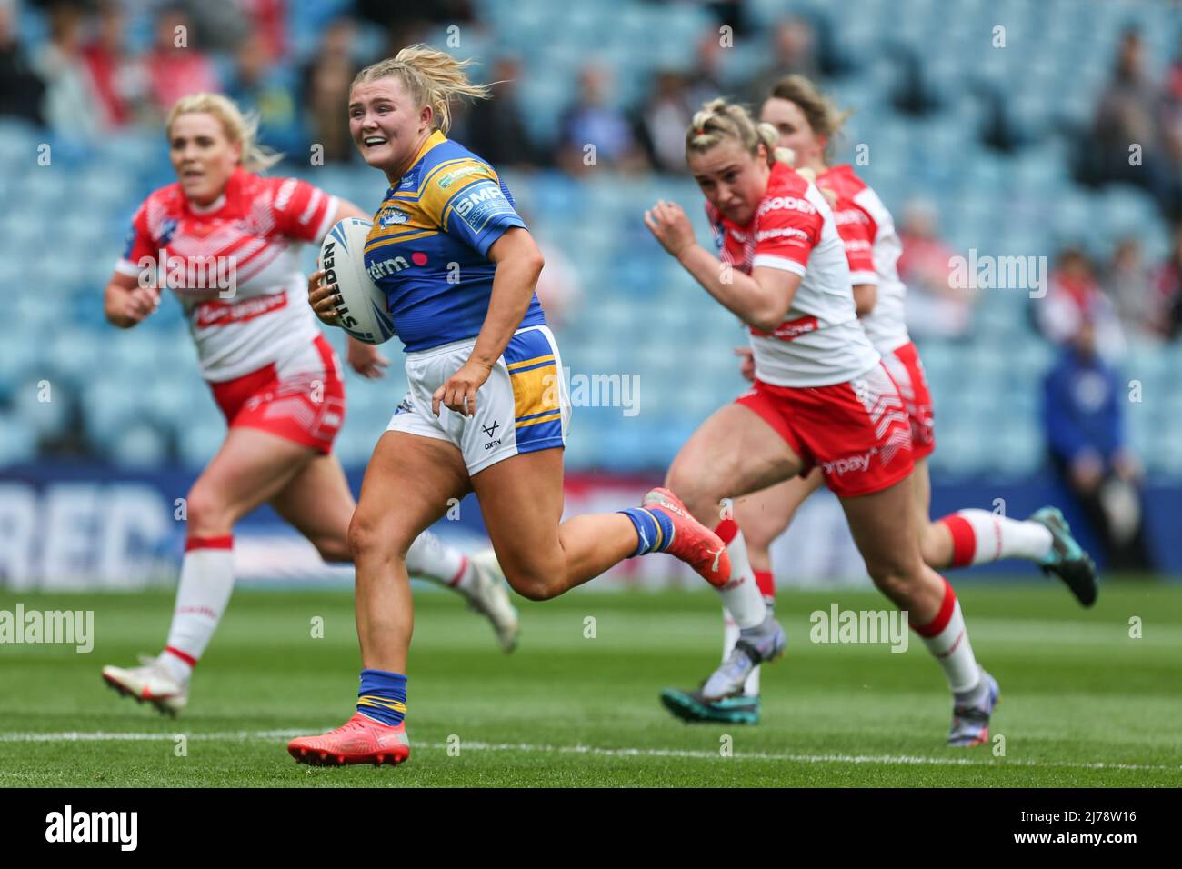 Zoe Hornby #15 of Leeds Rhinos runs for the try line to score the first ...