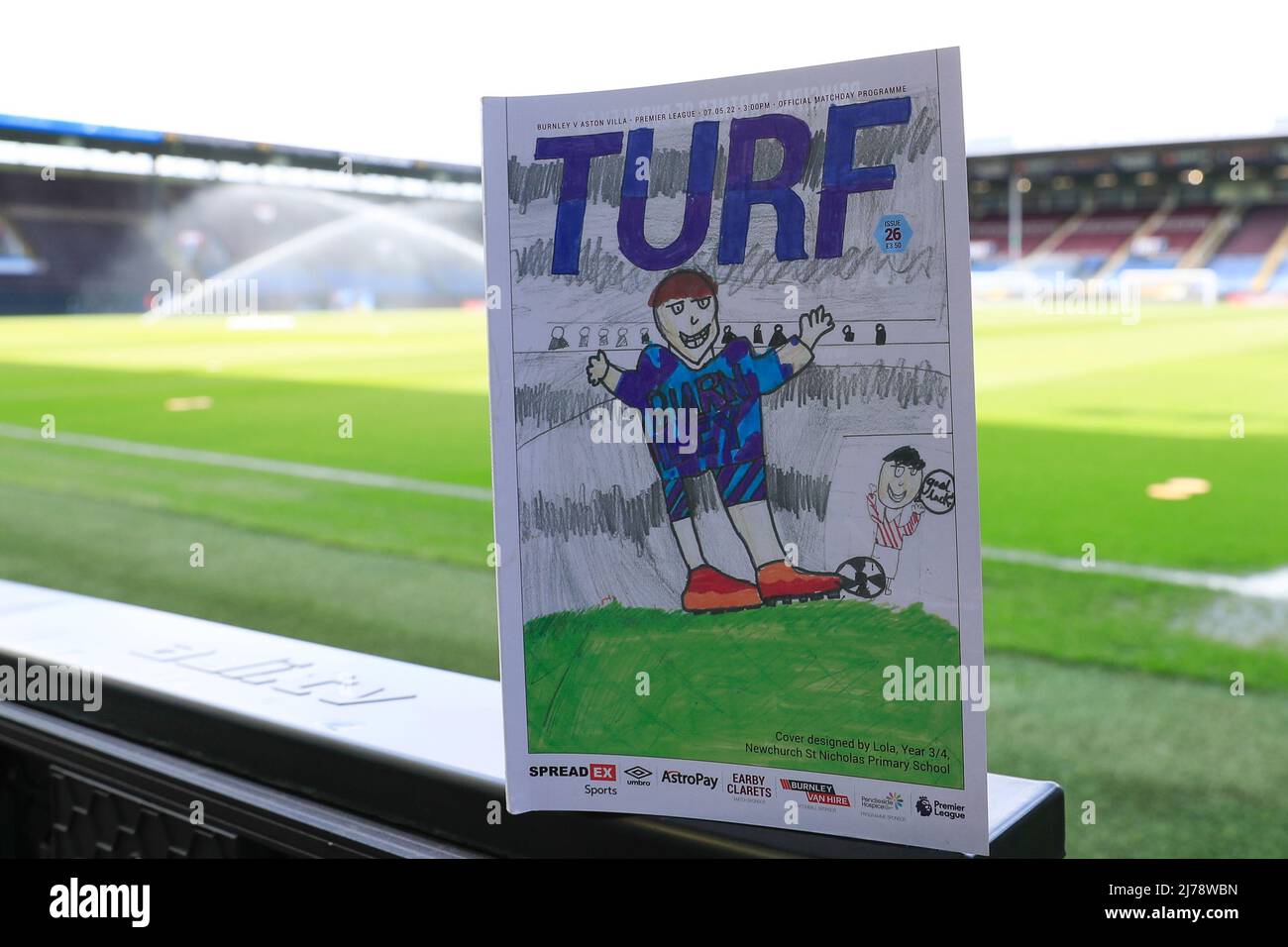 Matchday programme showing cover design by a primary school Stock Photo ...