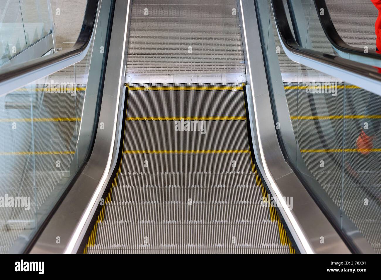 International Airport building with escalator moving staircase Stock ...