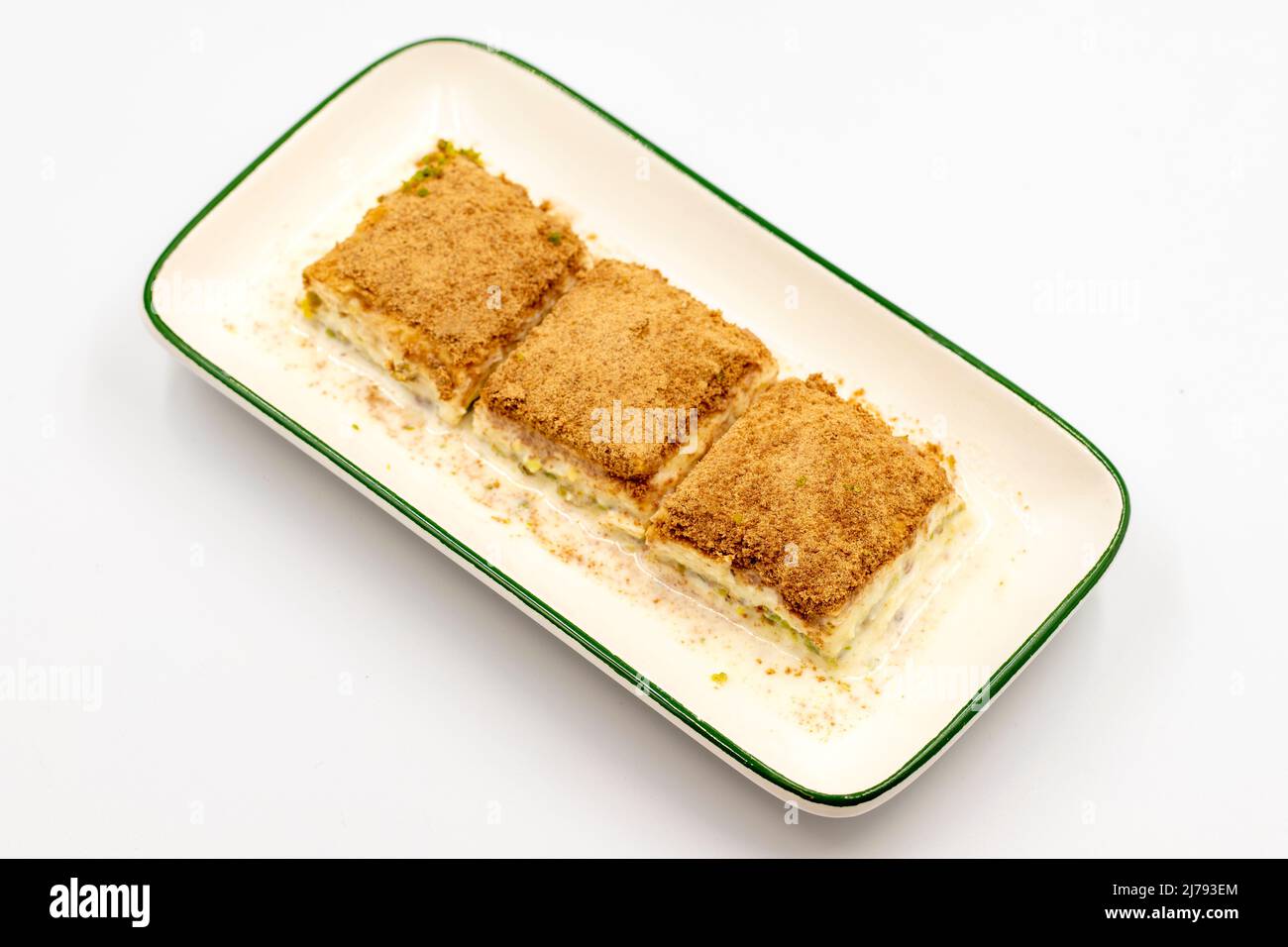 Cold baklava. Baklava with milk isolated on a white background ...