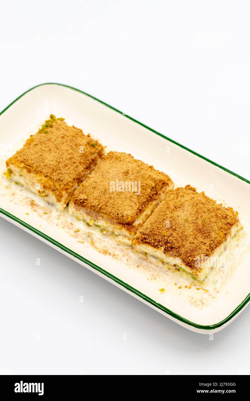 Cold baklava. Baklava with milk isolated on a white background ...