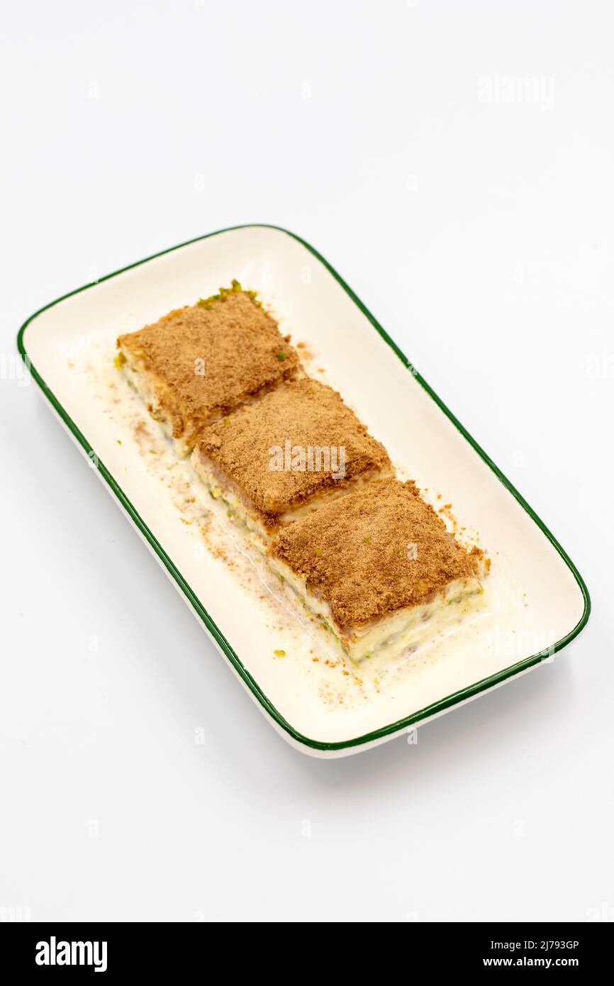 Cold baklava. Baklava with milk isolated on a white background ...