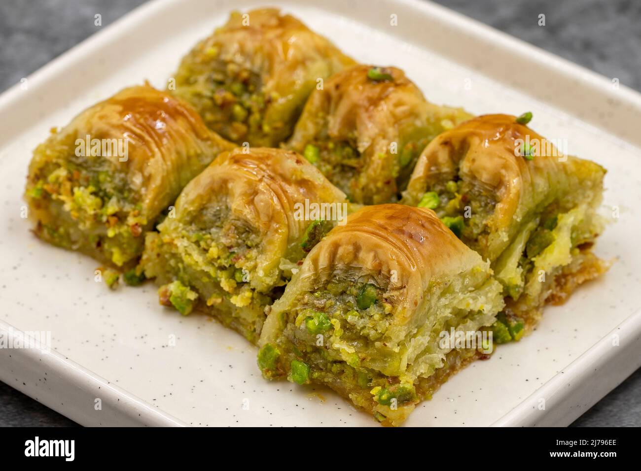 Pistachio baklava. Baklava with pistachio on a dark background ...