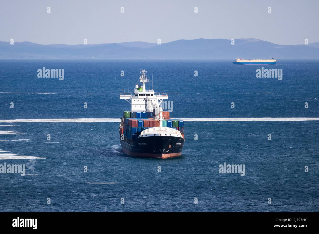 Merchant ship carrying containers hi-res stock photography and images ...