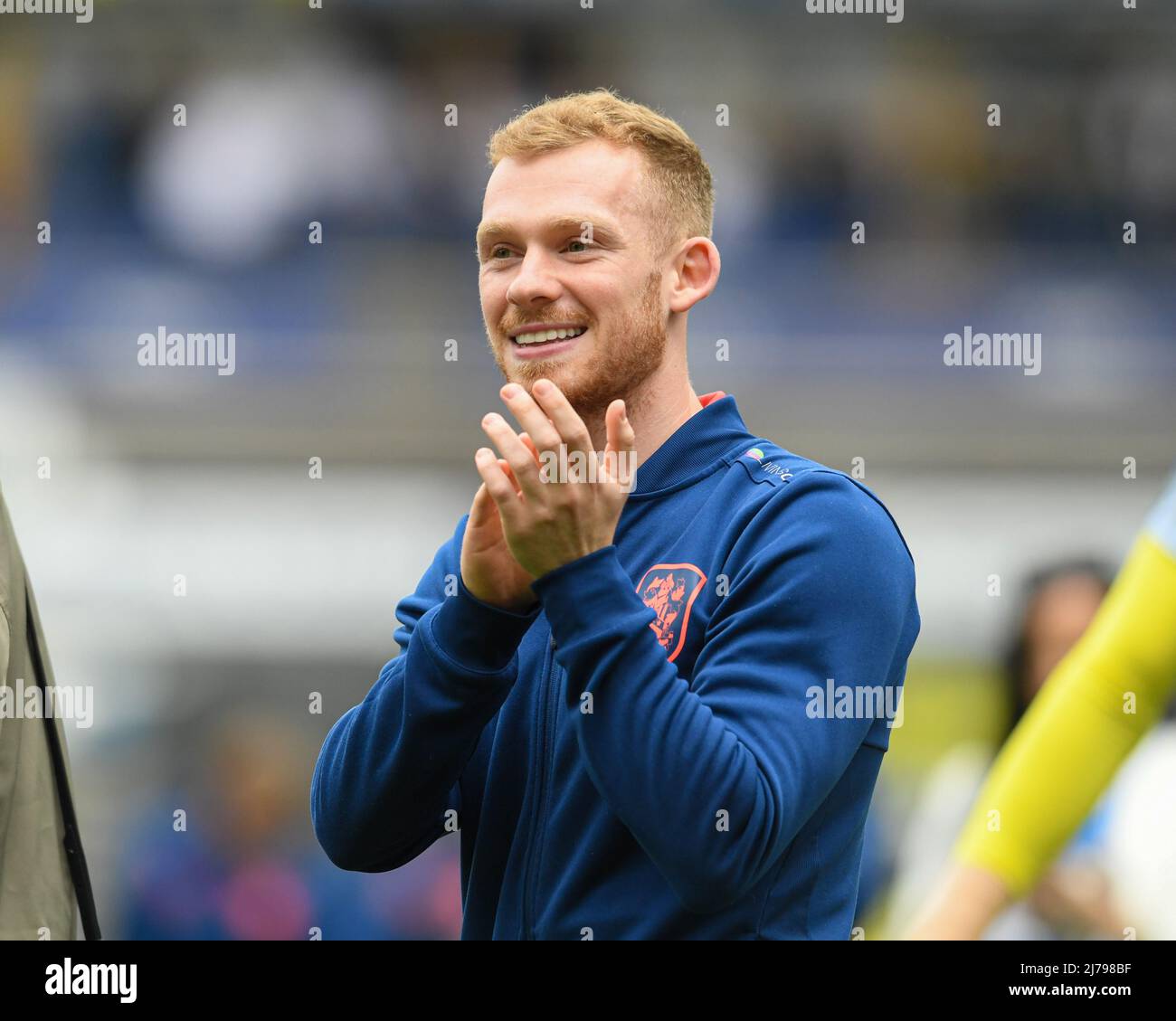 Lewis O'Brien #8 of Huddersfield Town applauds the home supporters at ...
