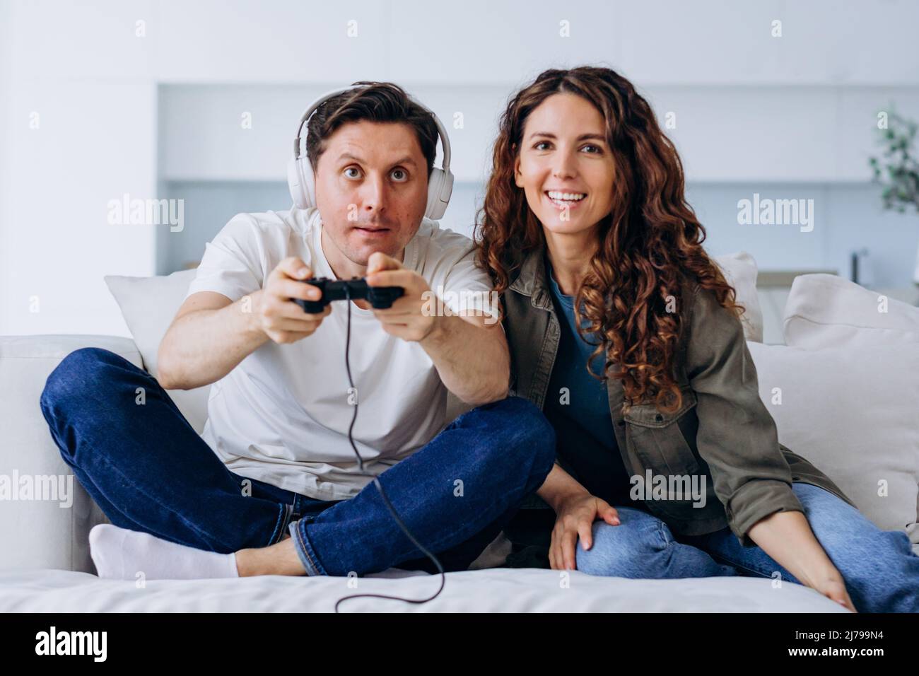 Woman kisses man cheek hi-res stock photography and images - Alamy