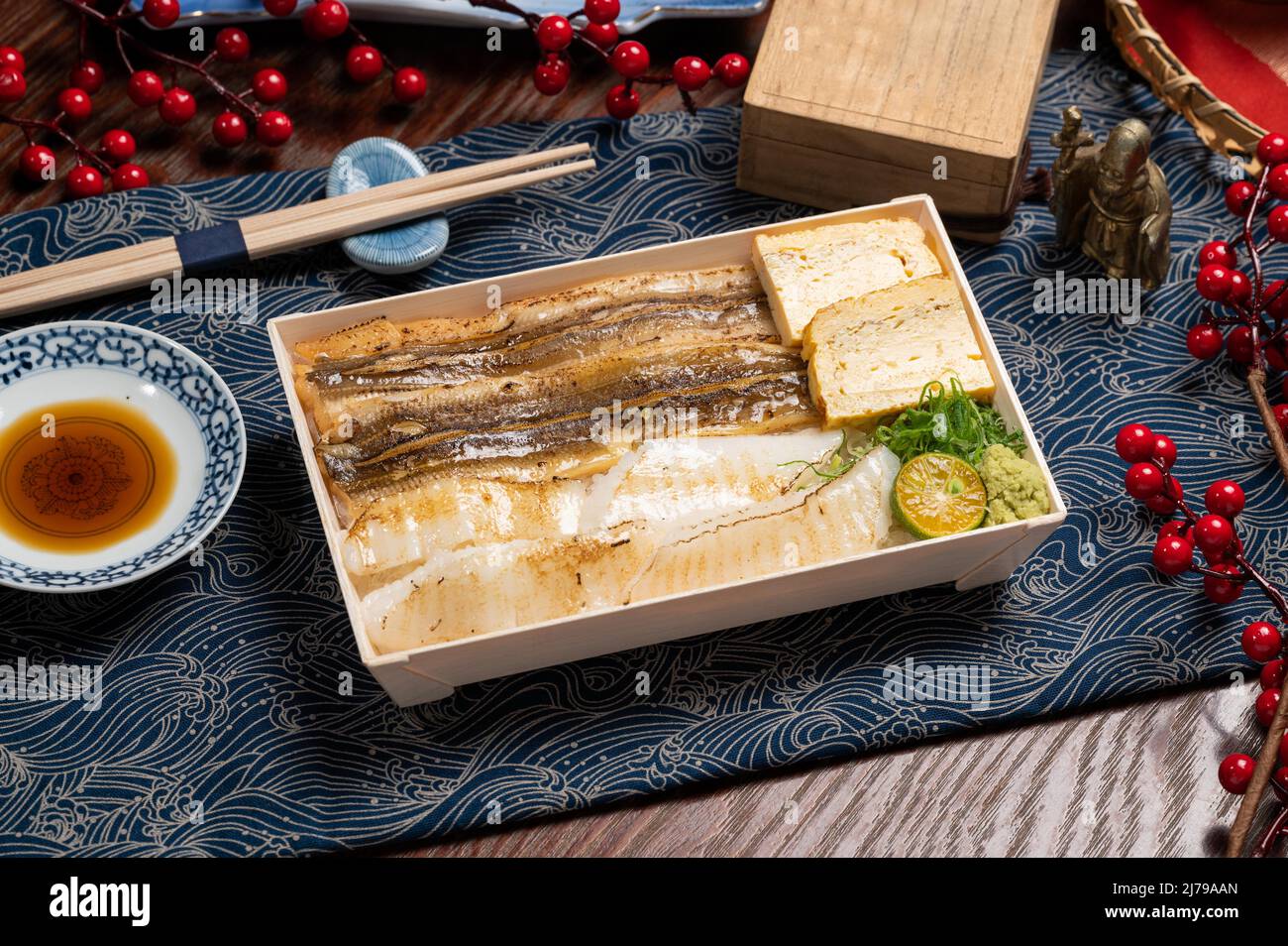 Eel fish star eel bowl in a dish with chopsticks isolated on mat side ...