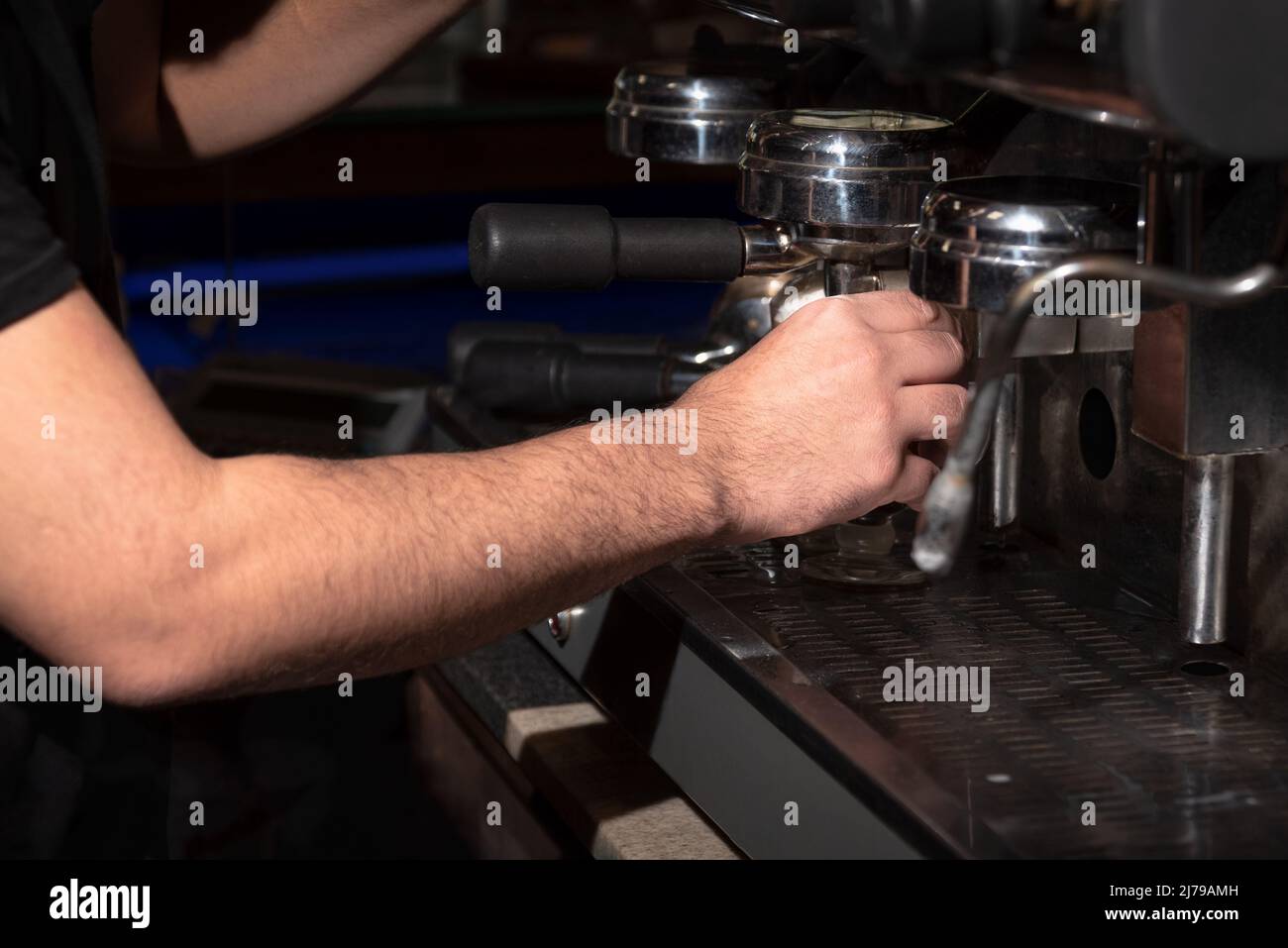 Using the coffee machine. Man hands. Horizontal. Color Stock Photo - Alamy